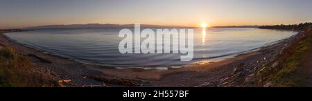 Sunset at Finlayson Point, Victoria, Canada. Silhouettes of people and ...