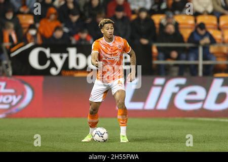 Jordan Gabriel #4 of Blackpool looks for assistance Stock Photo - Alamy