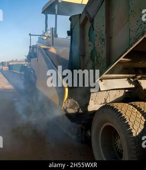 Road Construction equipment making repairs to street Stock Photo - Alamy