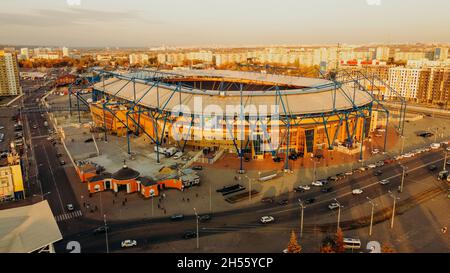 KHARKIV, UKRAINE - OCTOBER 22, 2021: Metalist stadium in sunset lights ...