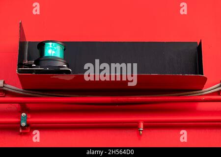 green starboard navigation light aboard a tall ship Stock Photo - Alamy