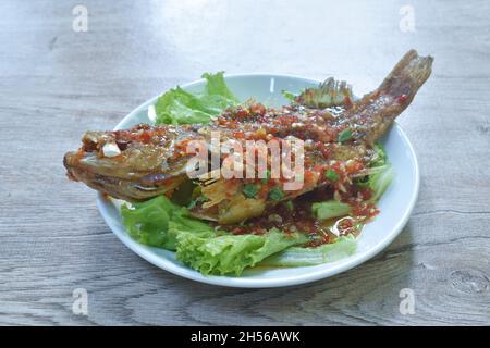 batter fried red grouper fish dressing ginger with mushroom in soy ...