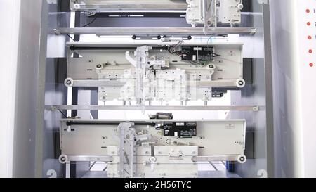 Modern elevator shaft interior with cables and tracks Stock Photo - Alamy