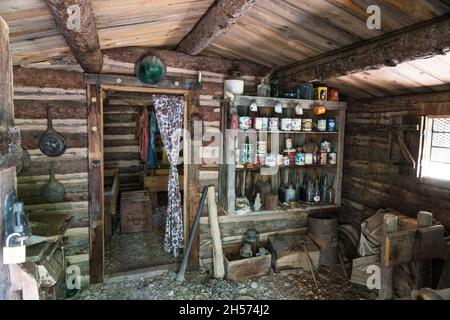 Interior of Dalton Cabin, Miners Park in Bullion City, Canyon of Gold ...