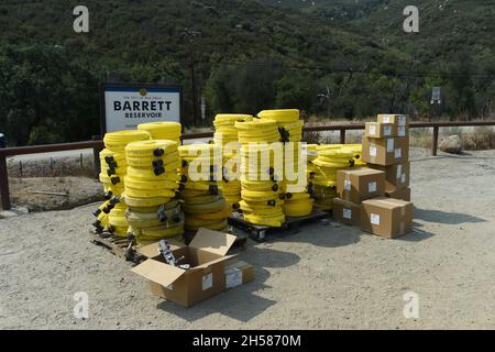 Cal Fire hose packs and associated valves await use at wildland fire ...