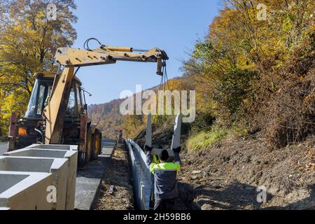 Construction site road burial of u-shaped gutter precast concrete drain ...