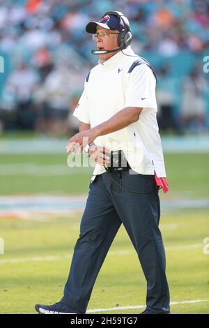 Houston Texans coach David Culley, left, laughs before an NFL football ...
