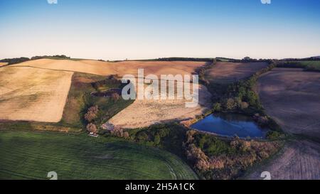 Beautiful view on agricultural crop and wheat fields on a sunny summer ...