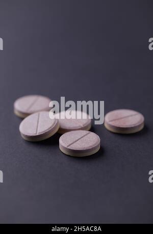 Vitamin effervescent Tablets on paper background. Close up. Copy space ...