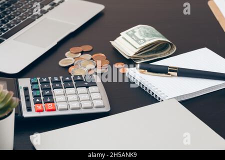 avings, finances, economy and home concept - close up of calculator ...