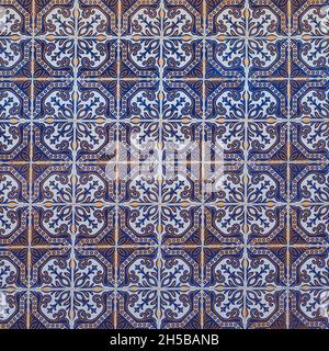 Fragment of building wall with colorful ceramic wall tiles. Azulejos ...