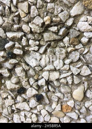 close-up of a wall covered with small stones Stock Photo - Alamy