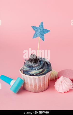 Yummy cupcake on light pink background close up Stock Photo - Alamy