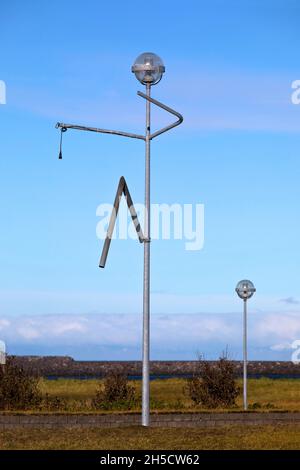street lamp artistically designed as a male figure, Iceland, Reykjanes ...