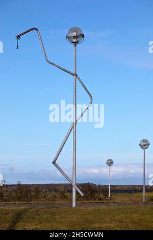 street lamp artistically designed as a male figure, Iceland, Reykjanes ...