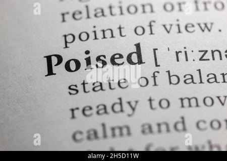 Fake Dictionary word, Dictionary definition of poised Stock Photo - Alamy