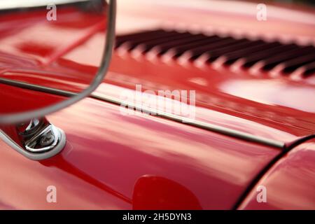 Bonnet louvres and wing mirror of red E-type Jaguar sportscar Stock ...