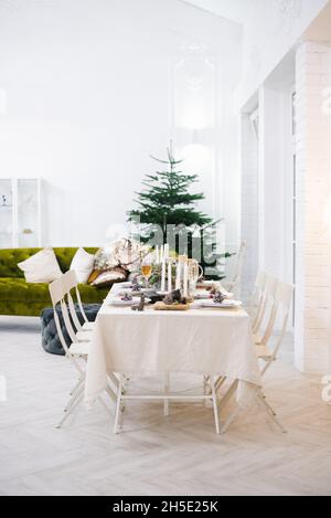 Cozy classic table for celebrating Christmas or New Year in a ...