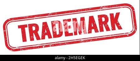 TRADEMARK text on red grungy rectangle stamp sign Stock Photo - Alamy