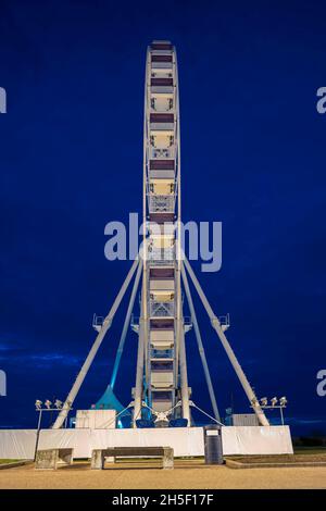 Great Yarmouth big wheel and beach huts Stock Photo - Alamy