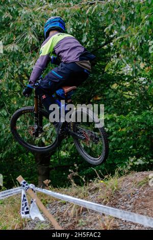 THALE, GERMANY - Sep 15, 2021: A trail biker during the Rosstrappen Thale Harz Downhill Cup in ...