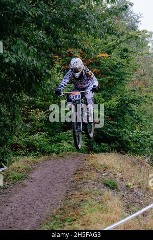 THALE, GERMANY - Sep 15, 2021: A trail biker during the Rosstrappen Thale Harz Downhill Cup in ...