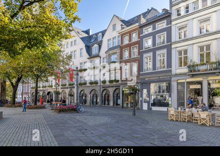 Narrow streets in Aachen old town with incidental people walking by ...