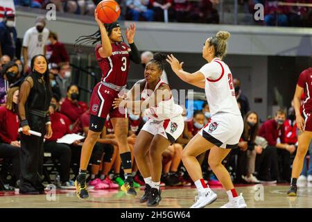 North Carolina State's Madison Hayes (21) drives as North Carolina's ...