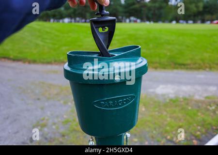 Golf ball station for washing dirty golf balls Stock Photo - Alamy
