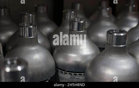 A collection of silver gas cylinders Stock Photo - Alamy