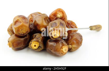 Group of ripe soft and sticky Zamli dates fruit, Zamli dates have a ...