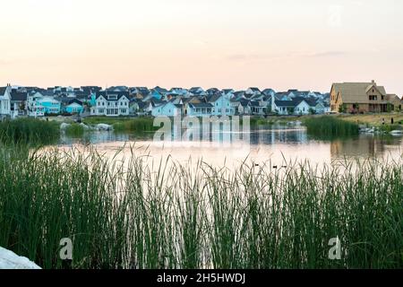 Houses on grass on natural background Stock Photo - Alamy