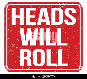 HEADS WILL ROLL text written on black-green rectangle stamp sign Stock ...