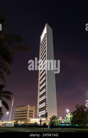 ADNOC Headquarters building, a skyscraper at dusk; Abu Dhabi, United ...