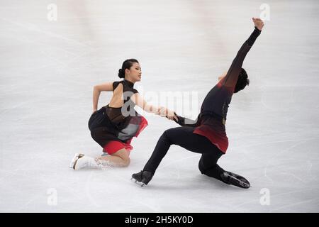 Shiyue WANG & Xinyu LIU, China, during practice, at the ISU Grand Prix ...