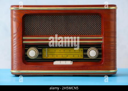 Retro radio receiver on light background Stock Photo - Alamy
