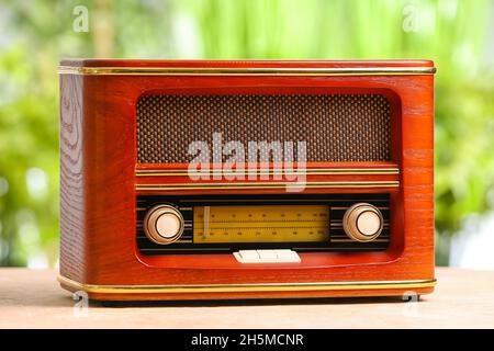 Retro radio receiver on table in living room Stock Photo - Alamy
