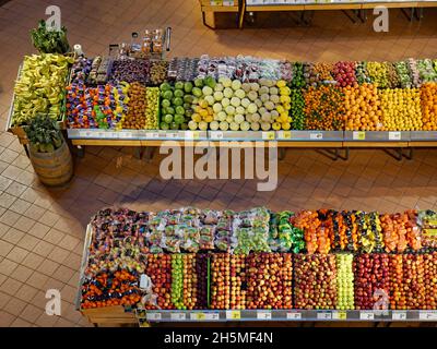 The fresh fruit and vegetable department of a large modern supermarket ...