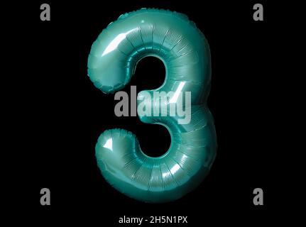 Black balloon in shape of figure 3 on color background Stock Photo - Alamy