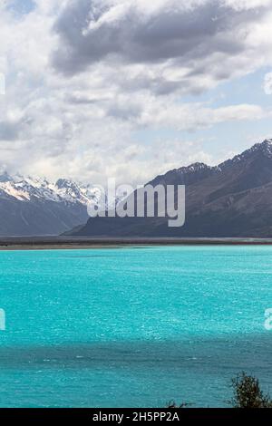Lake Pukaki. Lake with turquoise water among the mountains in the ...