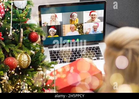 video call with happy diverse children on laptop computer in his ...