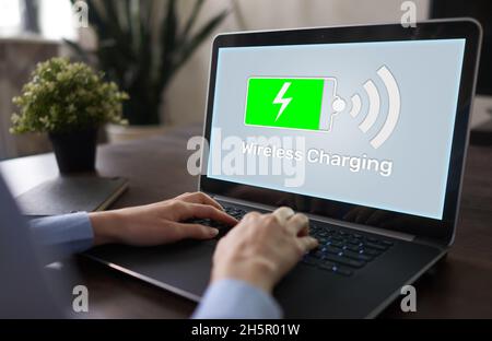 Wireless charging icons and progress bar on device screen Stock Photo ...