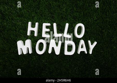 Hello Monday alphabet letter on yellow glitter background Stock Photo ...