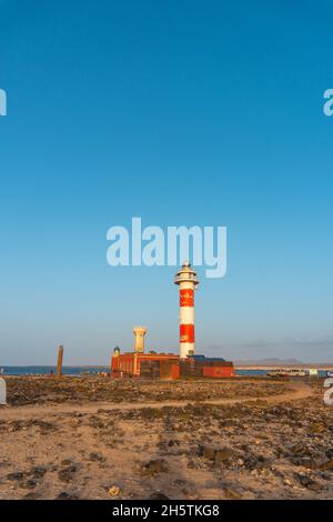 Beautiful view of the Toston Lighthouse at sunset in Punta Ballena ...