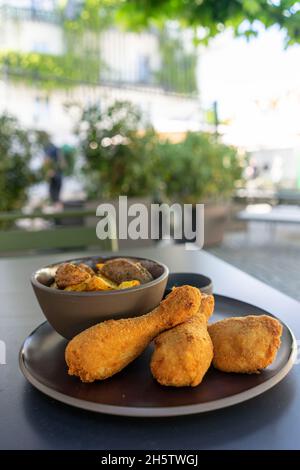 Traditional "leteci zganci" deep-fried chicken with potato in Ljubljana ...