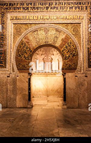 Horseshoe arched mihrab at the Great Mosque of Cordoba indicates the ...