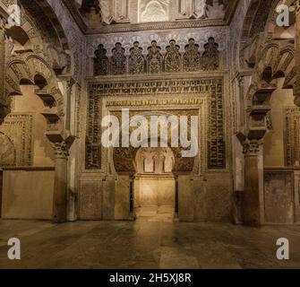 Horseshoe arched mihrab at the Great Mosque of Cordoba indicates the ...