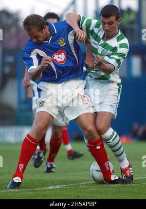 CELTIC'S SIMON LYNCH TANGLES WITH CARL TILER. PIC MIKE WALKER 2002 ...