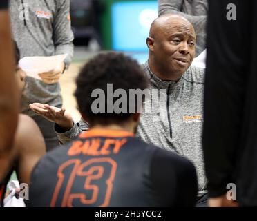 Pacific head coach Leonard Perry directs his team during the first half ...