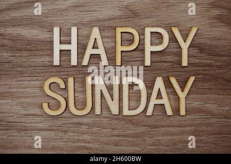 Happy Sunday text message on blue and pink background Stock Photo - Alamy